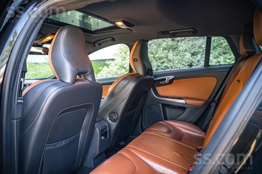 Black Volvo V60 2013 in Riga, with an engine capacity of 1.60 L and mileage of 303 thousand km for 4590 €, photo 11 on AUTOMOTO.COM.LV