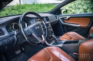 Black Volvo V60 2013 in Riga, with an engine capacity of 1.60 L and mileage of 303 thousand km for 4590 €, photo 13 on AUTOMOTO.COM.LV