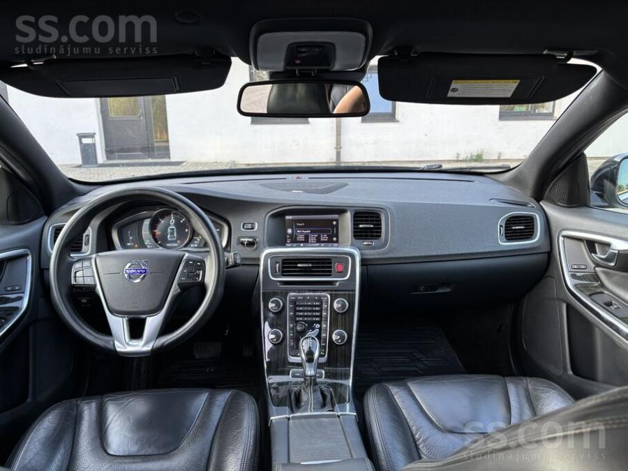 Black Volvo V60 2013 in Bauska, with an engine capacity of 2.40 L and mileage of 306 thousand km for 5000 €, photo 18 on AUTOMOTO.COM.LV
