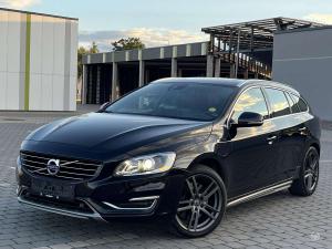 Black Volvo V60 2013 in Raseiniai, with an engine capacity of 2.40 L and mileage of 295 thousand km for 7299 €, photo  on AUTOMOTO.COM.LV
