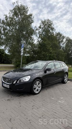 Black Volvo V60 2013 in Riga, with an engine capacity of 2.00 L and mileage of 173 thousand km for 7500 €, photo  on AUTOMOTO.COM.LV