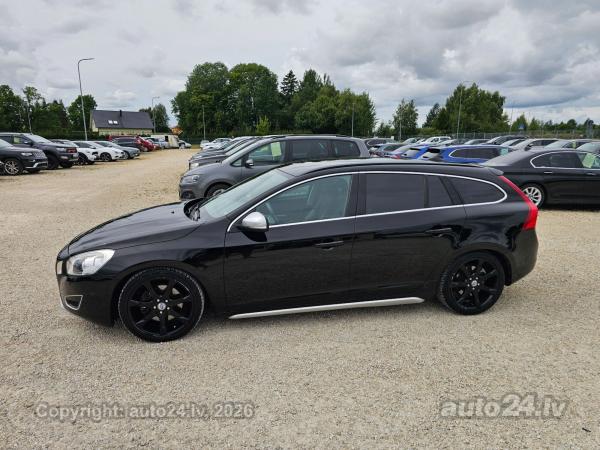Black Volvo V60 2013 in Tartu, with an engine capacity of 2.40 L and mileage of 245 thousand km for 6990 €, photo 3 on AUTOMOTO.COM.LV