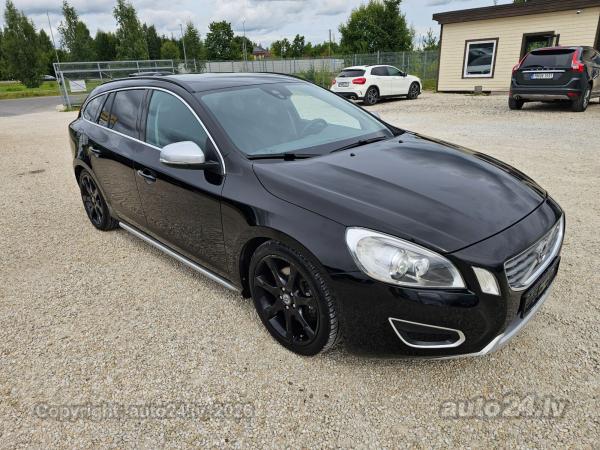Black Volvo V60 2013 in Tartu, with an engine capacity of 2.40 L and mileage of 245 thousand km for 6990 €, photo 7 on AUTOMOTO.COM.LV