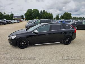 Black Volvo V60 2013 in Tartu, with an engine capacity of 2.40 L and mileage of 245 thousand km for 6990 €, photo 4 on AUTOMOTO.COM.LV