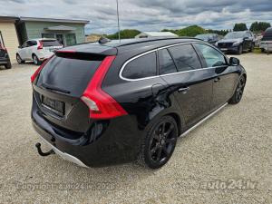 Black Volvo V60 2013 in Tartu, with an engine capacity of 2.40 L and mileage of 245 thousand km for 6990 €, photo 6 on AUTOMOTO.COM.LV
