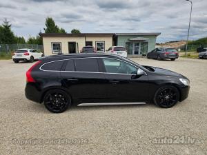 Black Volvo V60 2013 in Tartu, with an engine capacity of 2.40 L and mileage of 245 thousand km for 6990 €, photo 7 on AUTOMOTO.COM.LV