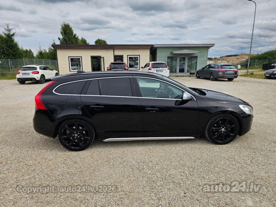 Black Volvo V60 2013 in Tartu, with an engine capacity of 2.40 L and mileage of 245 thousand km for 6990 €, photo 7 on AUTOMOTO.COM.LV