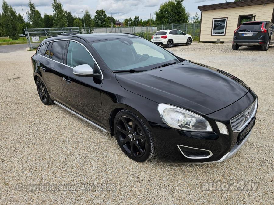 Black Volvo V60 2013 in Tartu, with an engine capacity of 2.40 L and mileage of 245 thousand km for 6990 €, photo 8 on AUTOMOTO.COM.LV
