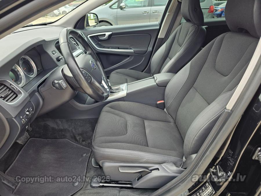 Black Volvo V60 2013 in Tartu, with an engine capacity of 2.40 L and mileage of 245 thousand km for 6990 €, photo 10 on AUTOMOTO.COM.LV