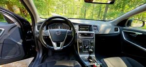 Black Volvo V60 2013 in Vilnius, with an engine capacity of 1.98 L and mileage of 289 thousand km for 6399 €, photo 12 on AUTOMOTO.COM.LV