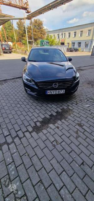 Melns Volvo V60 2013 Viļņa, ar dzinēja tilpumu 2.40 L un nobraukumu 303 tūkst. km par 7300 €, foto  vietnē AUTOMOTO.COM.LV