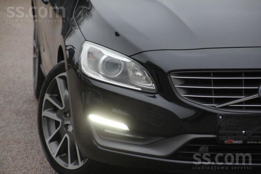 Black Volvo V60 2014 in Tukums, with an engine capacity of 2.00 L and mileage of 257 thousand km for 7990 €, photo 26 on AUTOMOTO.COM.LV