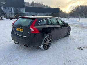Black Volvo V60 2014 in Vilnius, with an engine capacity of 2.40 L and mileage of 296 thousand km for 7900 €, photo 6 on AUTOMOTO.COM.LV