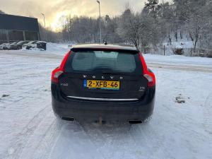 Black Volvo V60 2014 in Vilnius, with an engine capacity of 2.40 L and mileage of 296 thousand km for 7900 €, photo 7 on AUTOMOTO.COM.LV