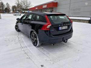 Black Volvo V60 2014 in Alytus, with an engine capacity of 1.98 L and mileage of 250 thousand km for 8170 €, photo 10 on AUTOMOTO.COM.LV