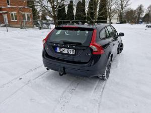 Black Volvo V60 2014 in Alytus, with an engine capacity of 1.98 L and mileage of 250 thousand km for 8170 €, photo 20 on AUTOMOTO.COM.LV