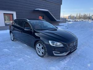 Black Volvo V60 2014 in Kaunas, with an engine capacity of 1.98 L and mileage of 286 thousand km for 8190 €, photo 4 on AUTOMOTO.COM.LV