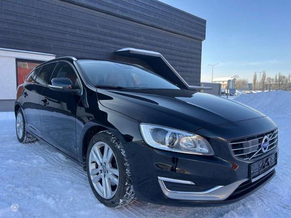 Black Volvo V60 2014 in Kaunas, with an engine capacity of 1.98 L and mileage of 286 thousand km for 7890 €, photo 2 on AUTOMOTO.COM.LV