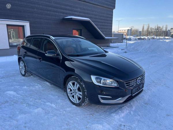 Black Volvo V60 2014 in Kaunas, with an engine capacity of 1.98 L and mileage of 286 thousand km for 7890 €, photo 5 on AUTOMOTO.COM.LV