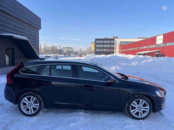 Black Volvo V60 2014 in Kaunas, with an engine capacity of 1.98 L and mileage of 286 thousand km for 7890 €, photo 8 on AUTOMOTO.COM.LV