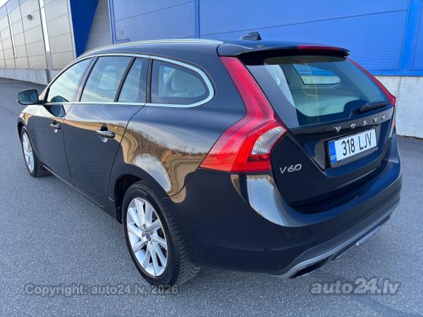 Black Volvo V60 2014 in Paide, with an engine capacity of 1.60 L and mileage of 235 thousand km for 7790 €, photo 4 on AUTOMOTO.COM.LV