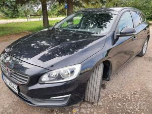 Black Volvo V60 2014 in Preili, with an engine capacity of 2.00 L and mileage of 335 thousand km for 7250 €, photo 8 on AUTOMOTO.COM.LV
