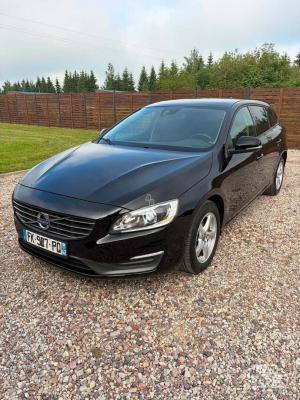 Black Volvo V60 2014 in Klaipeda, with an engine capacity of 2.00 L and mileage of 217 thousand km for 7200 €, photo  on AUTOMOTO.COM.LV