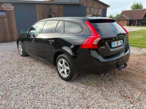 Black Volvo V60 2014 in Klaipeda, with an engine capacity of 2.00 L and mileage of 217 thousand km for 7200 €, photo 5 on AUTOMOTO.COM.LV