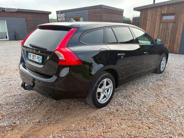 Black Volvo V60 2014 in Klaipeda, with an engine capacity of 2.00 L and mileage of 217 thousand km for 7200 €, photo 8 on AUTOMOTO.COM.LV