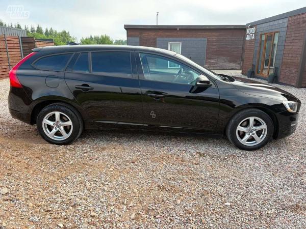 Black Volvo V60 2014 in Klaipeda, with an engine capacity of 2.00 L and mileage of 217 thousand km for 7200 €, photo 9 on AUTOMOTO.COM.LV