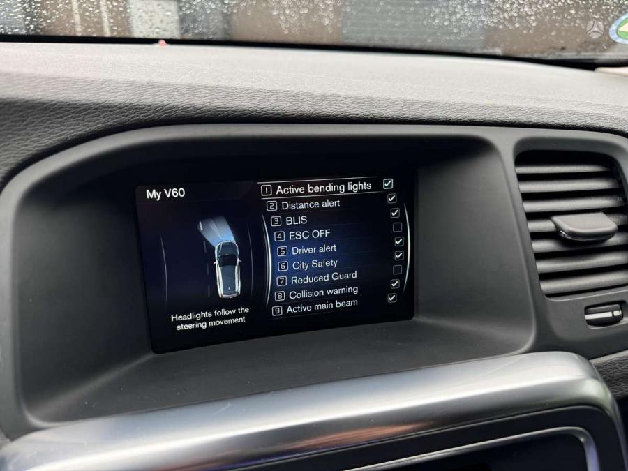 Black Volvo V60 2014 in Alytus, with an engine capacity of 2.40 L and mileage of 295 thousand km for 6500 €, photo 15 on AUTOMOTO.COM.LV