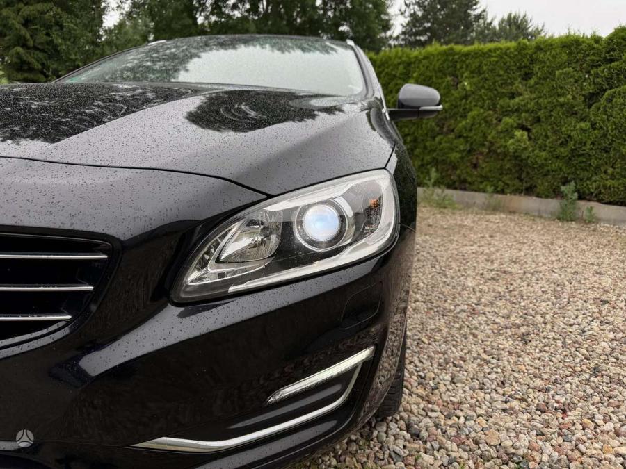 Black Volvo V60 2014 in Alytus, with an engine capacity of 2.40 L and mileage of 295 thousand km for 6500 €, photo 23 on AUTOMOTO.COM.LV