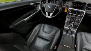 Black Volvo V60 2014 in Riga, with an engine capacity of 2.40 L and mileage of 149 thousand km for 13000 €, photo 13 on AUTOMOTO.COM.LV
