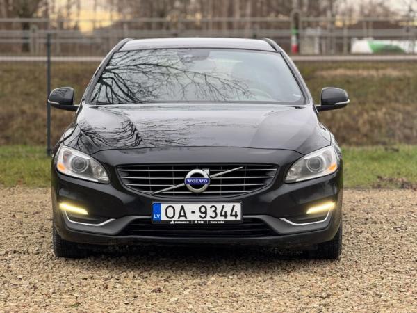 Black Volvo V60 2014 in Riga, with an engine capacity of 2.00 L and mileage of 262 thousand km for 7990 €, photo 1 on AUTOMOTO.COM.LV