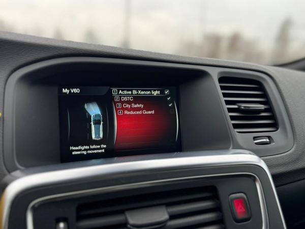 Black Volvo V60 2014 in Riga, with an engine capacity of 2.00 L and mileage of 262 thousand km for 7990 €, photo 7 on AUTOMOTO.COM.LV