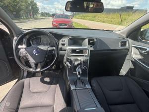 Black Volvo V60 2014 in Vilnius, with an engine capacity of 1.56 L and mileage of 221 thousand km for 4600 €, photo 16 on AUTOMOTO.COM.LV