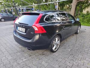Black Volvo V60 2014 in Riga, with an engine capacity of 2.00 L and mileage of 285 thousand km for 6900 €, photo 6 on AUTOMOTO.COM.LV