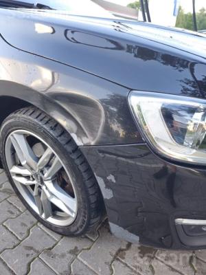 Black Volvo V60 2014 in Riga, with an engine capacity of 2.00 L and mileage of 285 thousand km for 6900 €, photo 12 on AUTOMOTO.COM.LV
