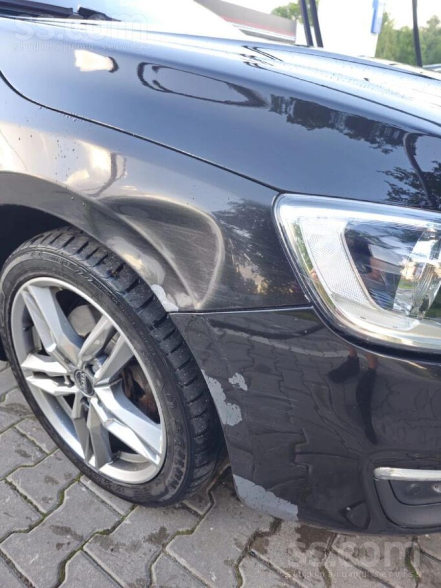 Black Volvo V60 2014 in Riga, with an engine capacity of 2.00 L and mileage of 285 thousand km for 6900 €, photo 12 on AUTOMOTO.COM.LV