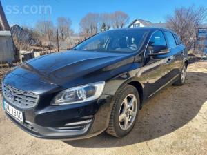 Black Volvo V60 2014 in Riga, with an engine capacity of 2.00 L and mileage of 269 thousand km for 7700 €, photo  on AUTOMOTO.COM.LV