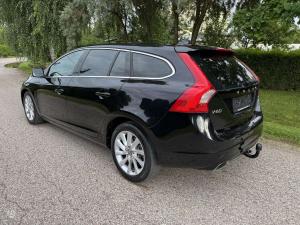 Black Volvo V60 2014 in Alytus, with an engine capacity of 1.98 L and mileage of 270 thousand km for 6250 €, photo 8 on AUTOMOTO.COM.LV