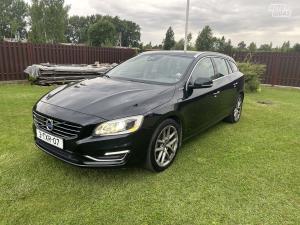 Melns Volvo V60 2014 Panevēža, ar dzinēja tilpumu 2.40 L un nobraukumu 300 tūkst. km par 6750 €, foto  vietnē AUTOMOTO.COM.LV