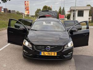 Black Volvo V60 2014 in Jonava, with an engine capacity of 2.40 L and mileage of 266 thousand km for 8250 €, photo 16 on AUTOMOTO.COM.LV