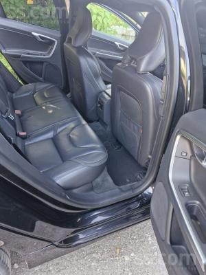 Black Volvo V60 2014 in Riga, with an engine capacity of 1.60 L and mileage of 220 thousand km for 6700 €, photo 4 on AUTOMOTO.COM.LV