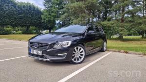 Black Volvo V60 2014 in Riga, with an engine capacity of 2.00 L and mileage of 175 thousand km for 9500 €, photo  on AUTOMOTO.COM.LV