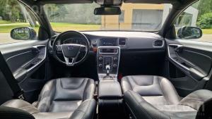 Black Volvo V60 2014 in Riga, with an engine capacity of 2.00 L and mileage of 175 thousand km for 9500 €, photo 6 on AUTOMOTO.COM.LV