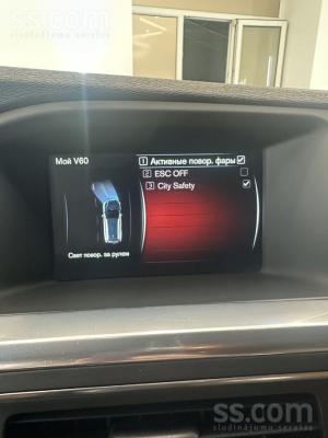 Black Volvo V60 2014 in Riga, with an engine capacity of 2.00 L and mileage of 254 thousand km for 7750 €, photo 9 on AUTOMOTO.COM.LV