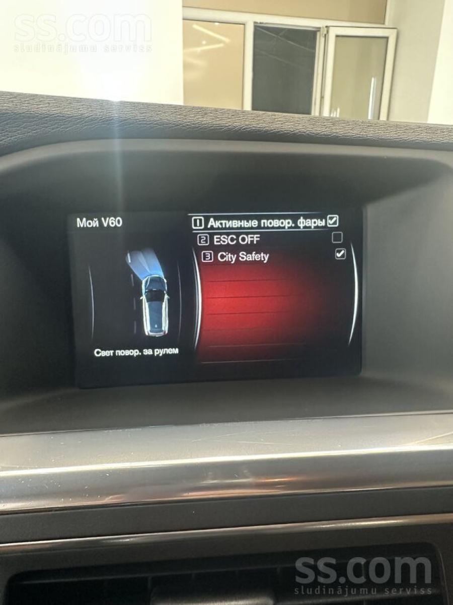 Black Volvo V60 2014 in Riga, with an engine capacity of 2.00 L and mileage of 254 thousand km for 7750 €, photo 9 on AUTOMOTO.COM.LV
