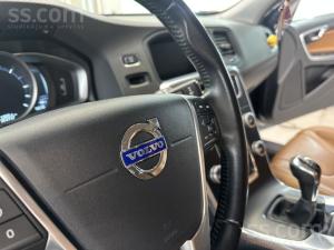 Black Volvo V60 2014 in Riga, with an engine capacity of 2.00 L and mileage of 254 thousand km for 7750 €, photo 13 on AUTOMOTO.COM.LV