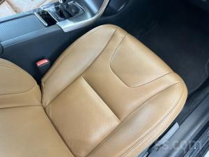 Black Volvo V60 2014 in Riga, with an engine capacity of 2.00 L and mileage of 254 thousand km for 7750 €, photo 19 on AUTOMOTO.COM.LV